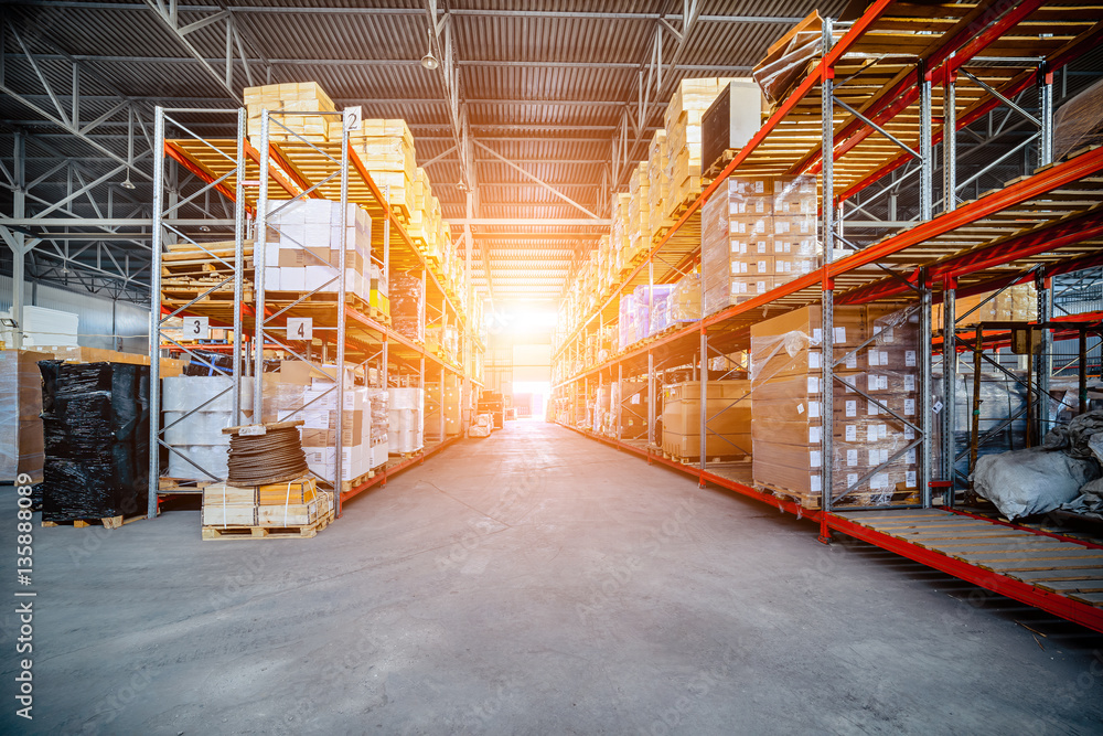 Long shelves with a variety of boxes and containers. Stock Photo ...