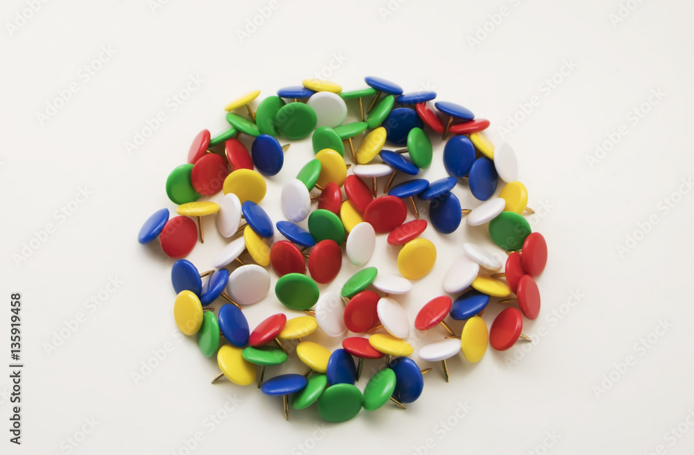 Colored push pins on a white background Stock Photo | Adobe Stock