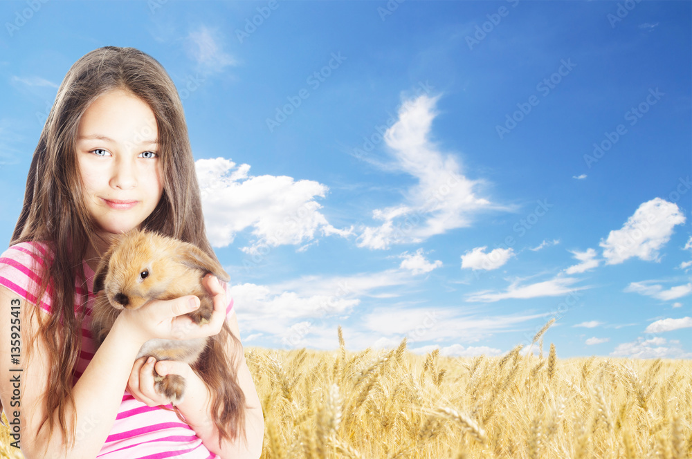 child hugging rabbit Stock Photo | Adobe Stock
