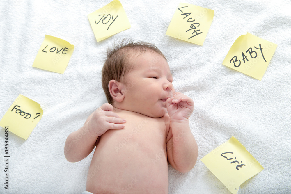 Baby presenting love and care with surrounding post it stickers Stock ...