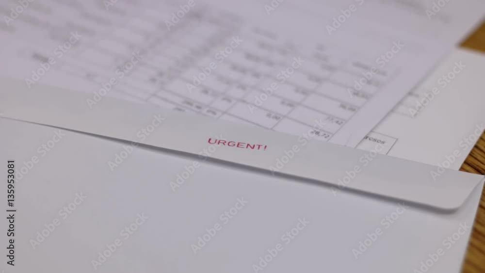 Urgent stamp on the envelope Stock Video | Adobe Stock