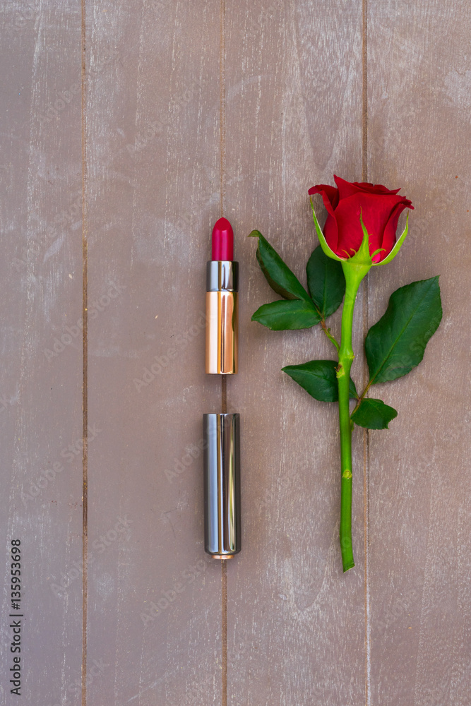Still life with fresh rose flower and open red lipstick Stock Photo ...