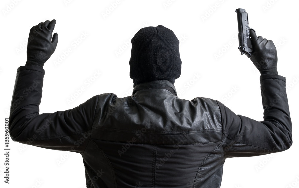 Burglar masked with balaclava is putting hands up and gives up. Stock ...