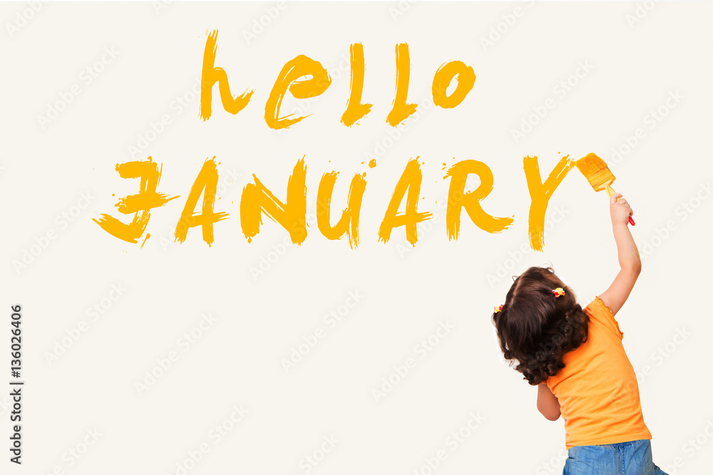 Cute little girl drawing : hello JANUARY with painting brush on wall ...