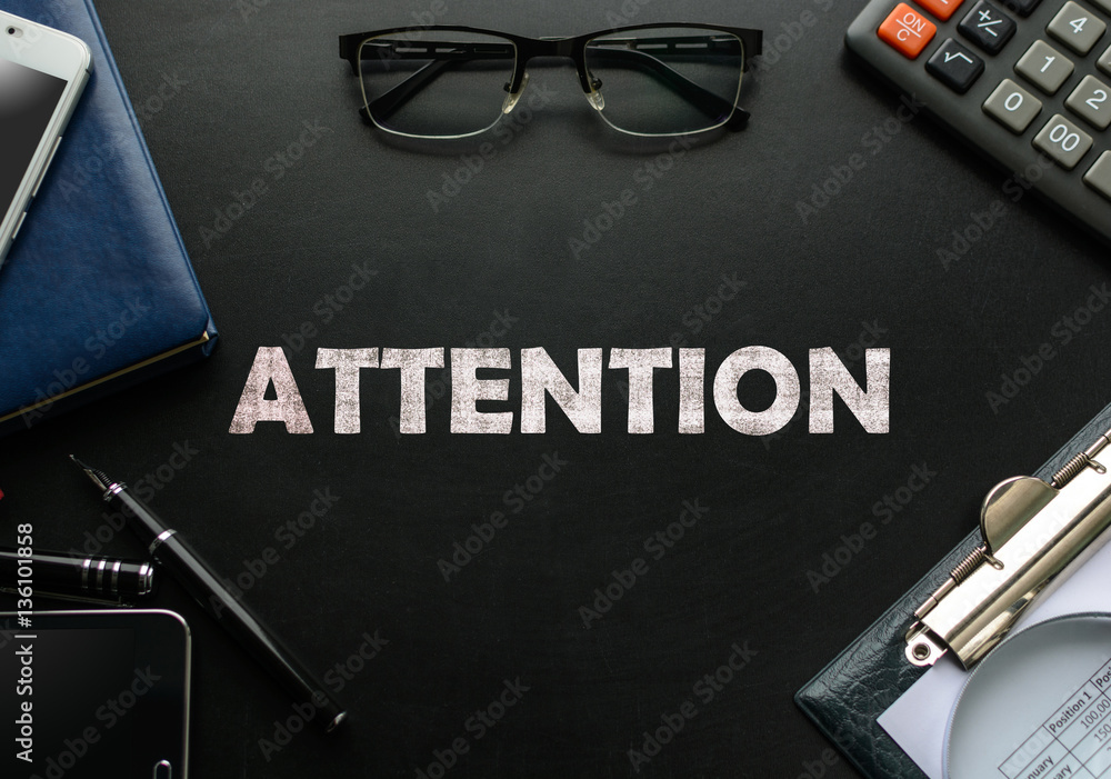 Black chalkboard with business accessories (notepad, magnifying glass ...