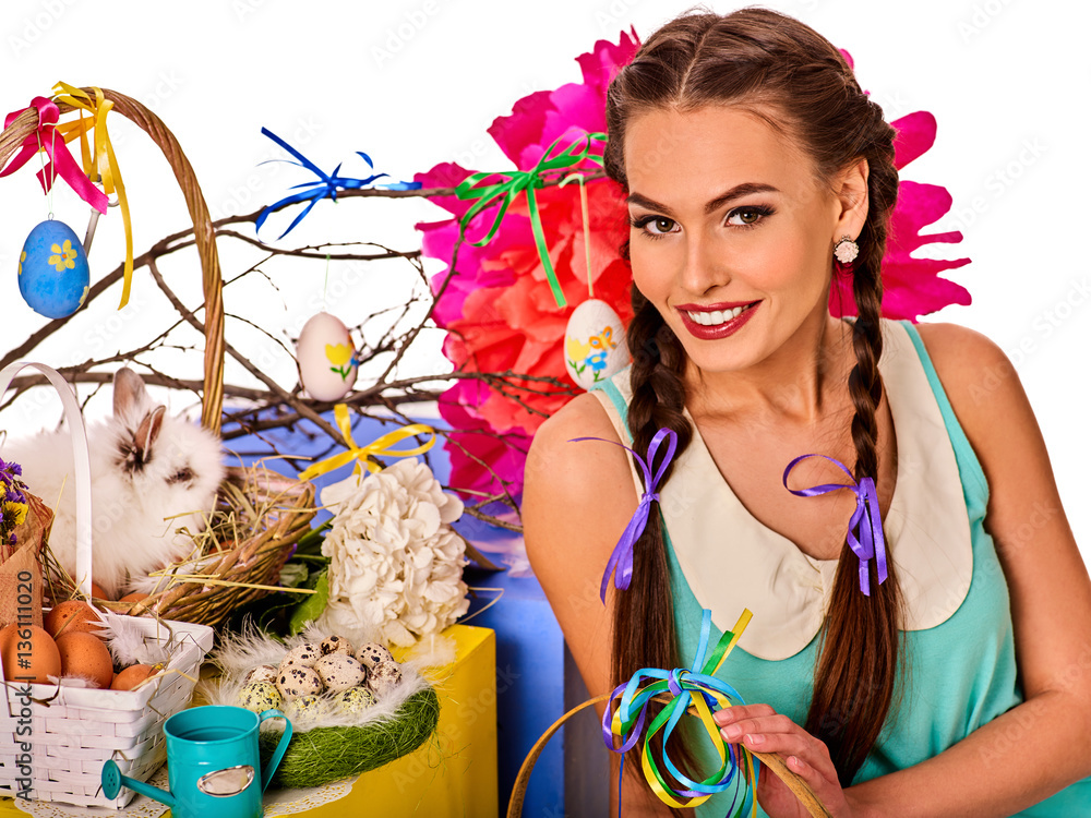 Easter girl holding bunny and eggs. Holiday style holding and group of ...