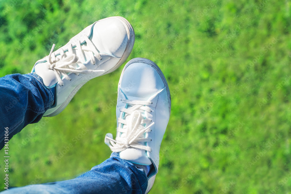 Aerial view of shoe laying on clear glass over green forest,Gree Stock ...