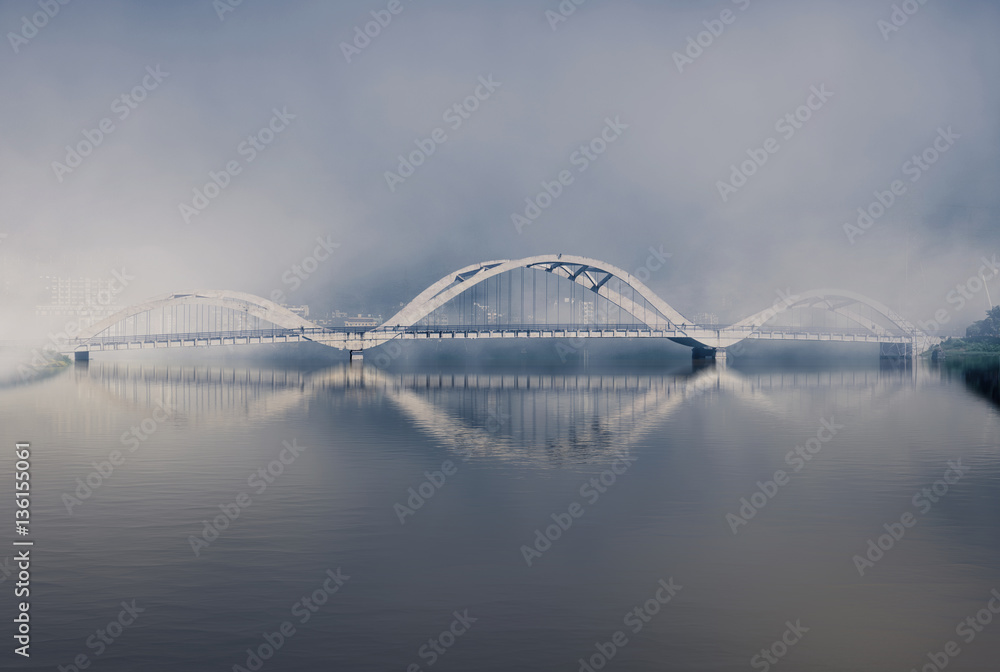 Hatirjheel bridge dhaka on foggy winter morning Stock Photo | Adobe Stock