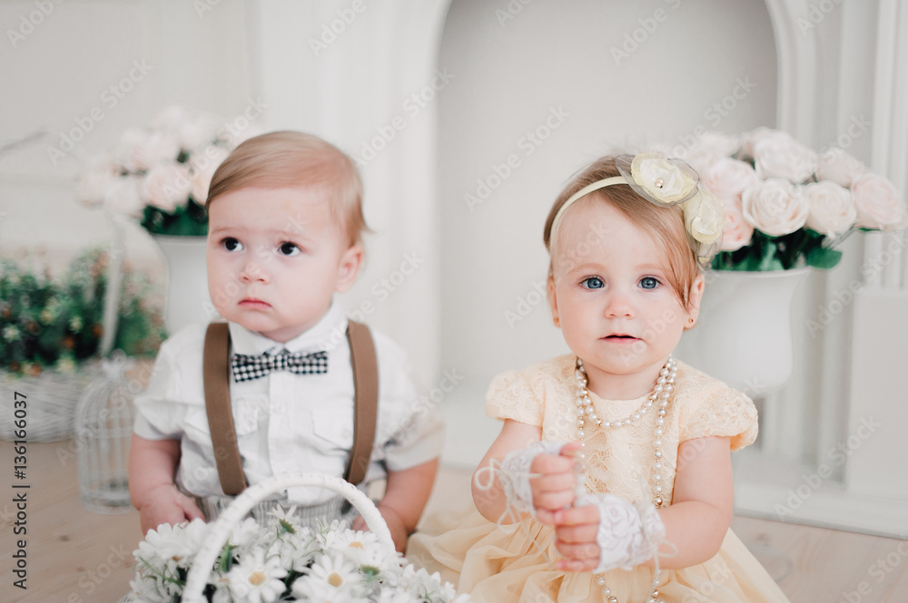 two babies wedding - boy and girl dressed as bride and groom Stock ...