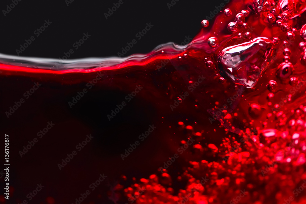 Abstract splashes of red wine on a black background Stock Photo | Adobe ...