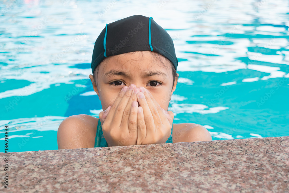 Little asian kids girl shivering in swimming pool. Summer outdoor ...