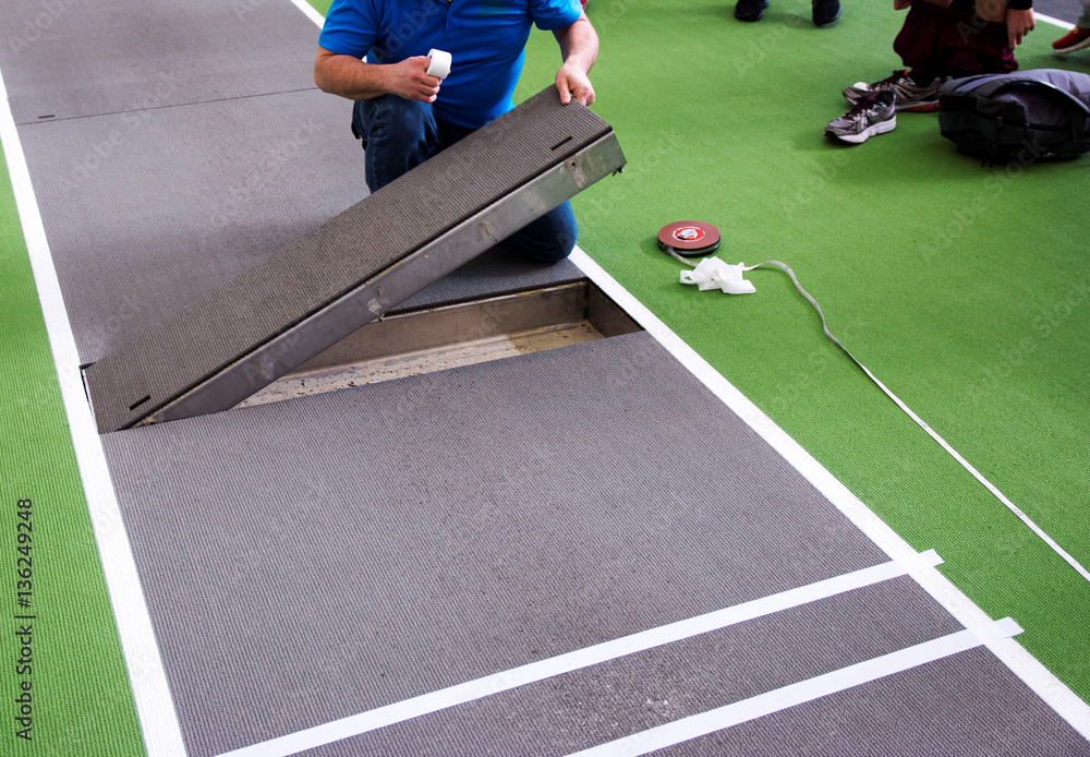 Long jump board being placed in the runway Stock Photo | Adobe Stock