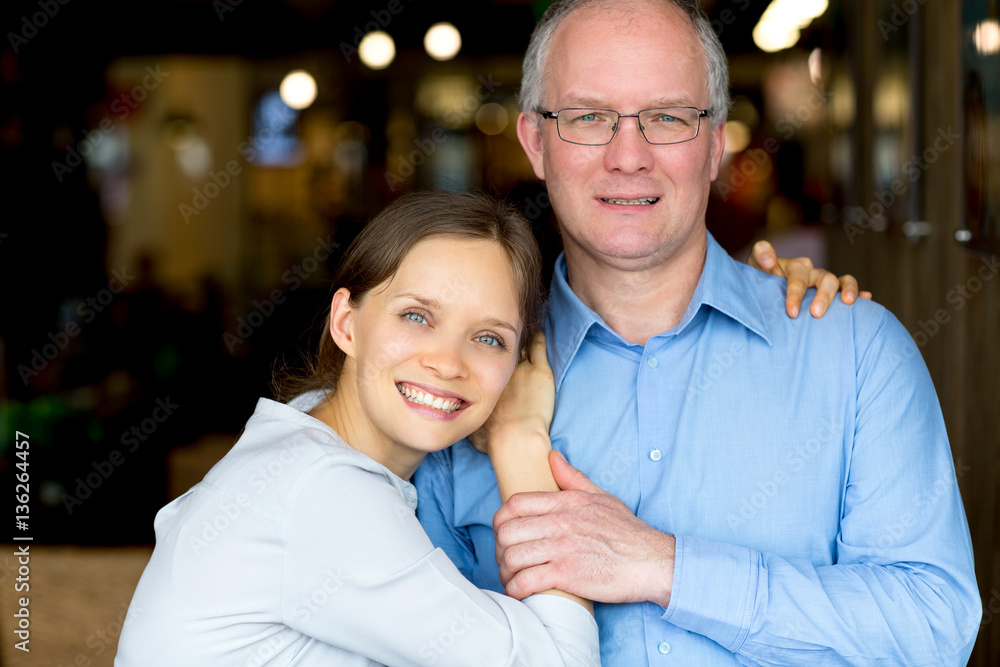 Happy Adult Daughter Embracing Middle-aged Father Stock Photo | Adobe Stock