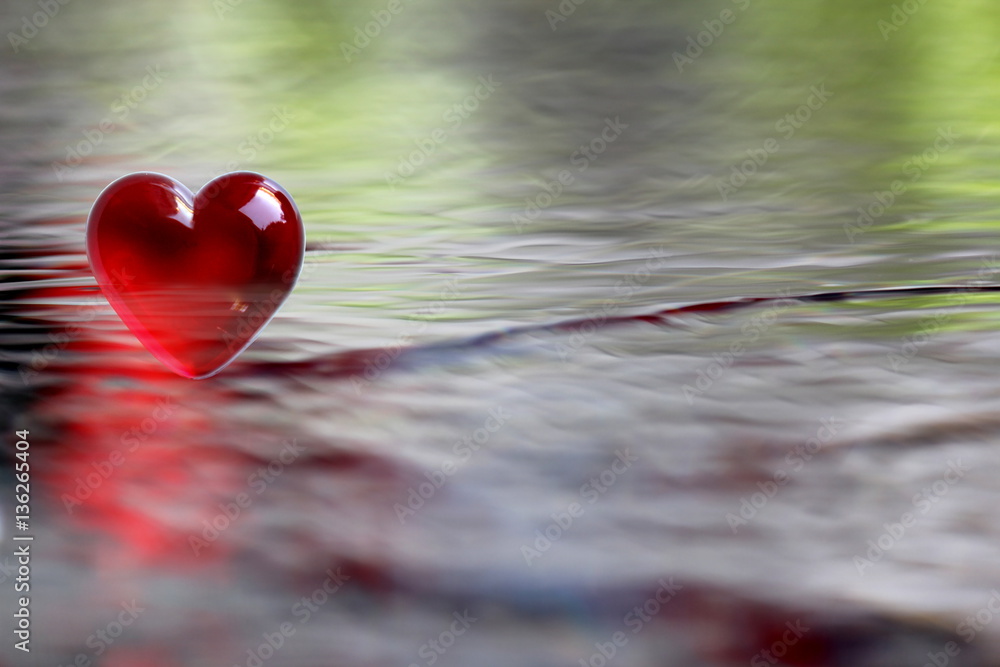 Red Heart with soft focus water reflections Stock Photo | Adobe Stock