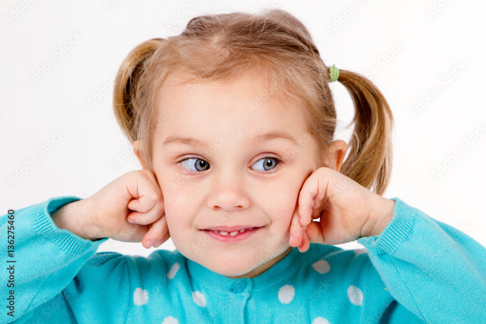 girl kid hands near the face Stock Photo | Adobe Stock