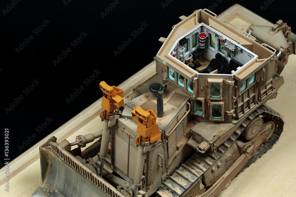 This photo is a scale model of an armored bulldozer, This bulldozer is ...