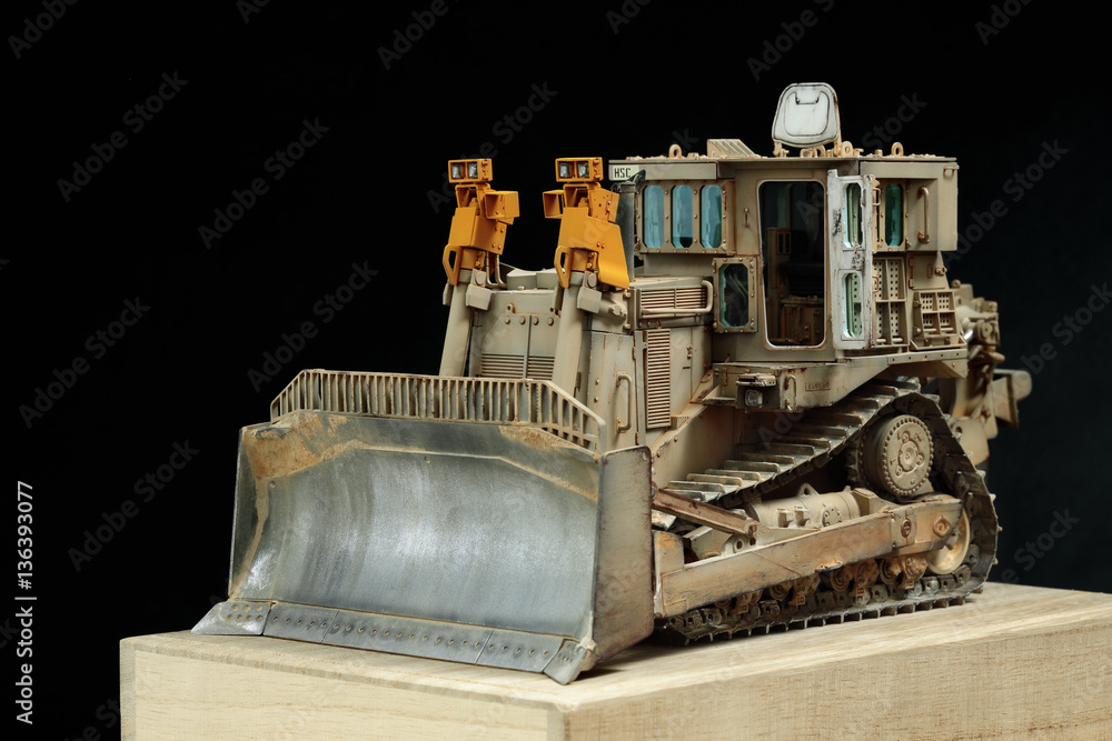 This photo is a scale model of an armored bulldozer, This bulldozer is ...