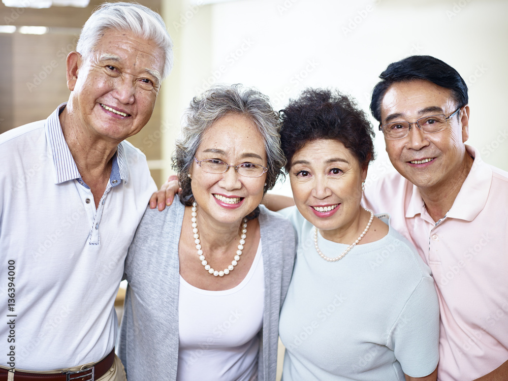 two senior asian couples getting together foto de Stock | Adobe Stock