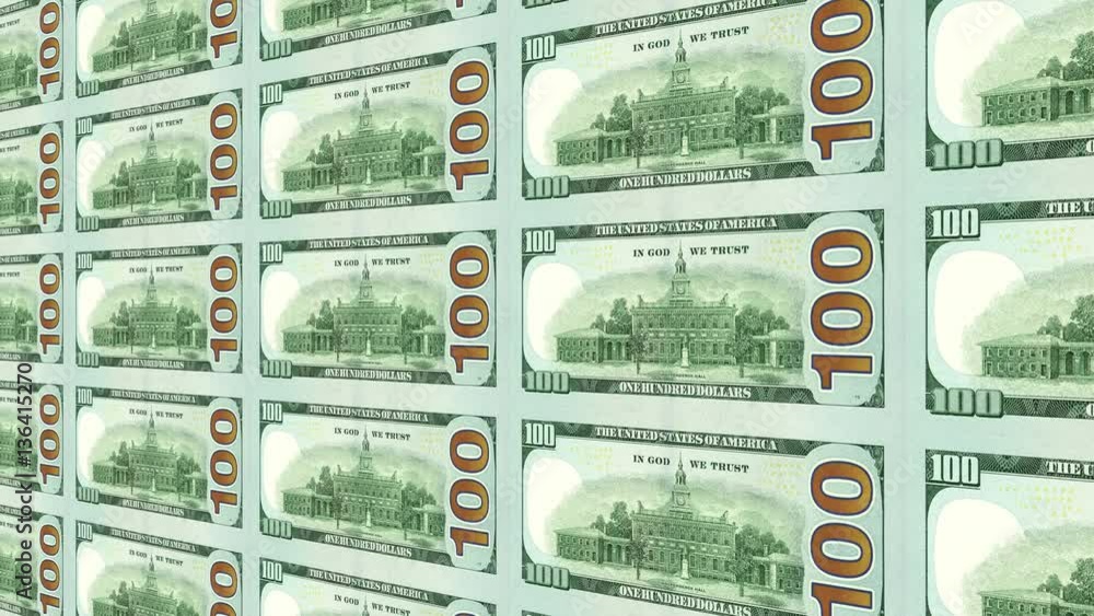 Reverse side of new 100 dollar bills moving from left to right in ...