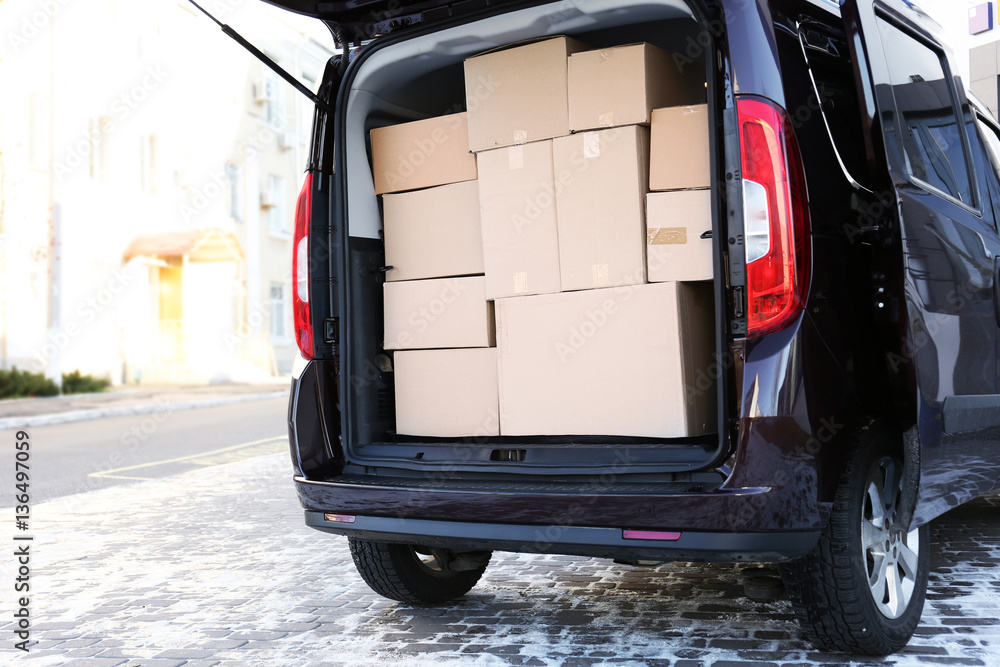 Office moving concept. Cartoon boxes in a car trunk Stock Photo | Adobe ...