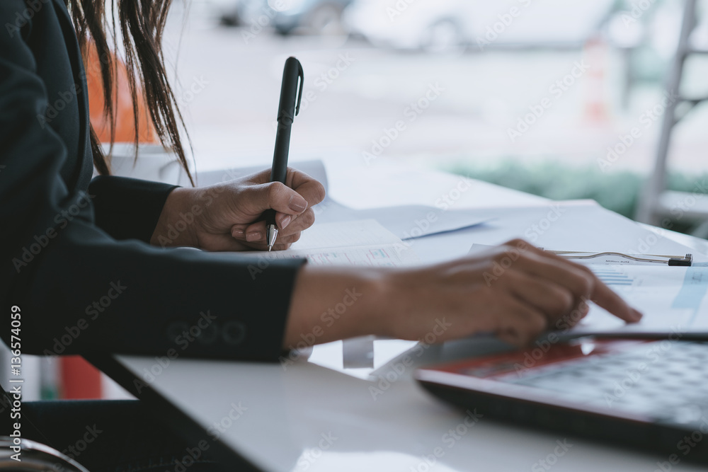 business home office desk background,hand holding pencil and writing ...