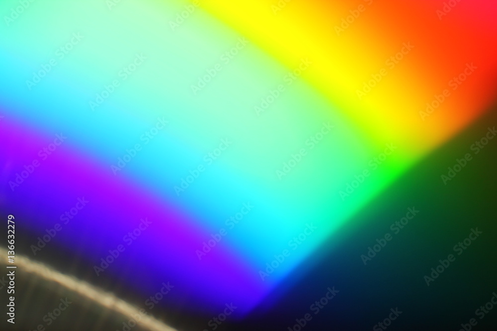 Abstract background - light color flashes and rays on black. Lens flare ...