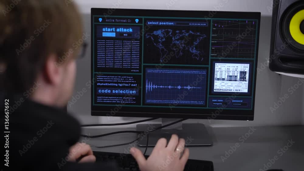 Back view of professinal hacker making cyber attack on network of the ...