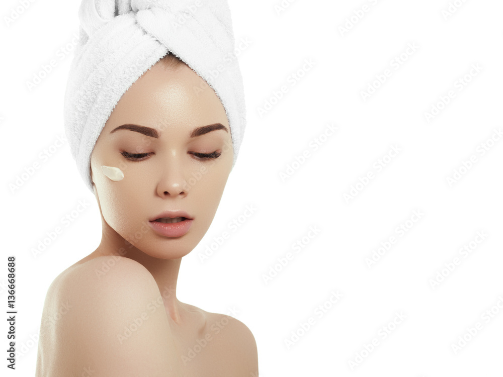 Spa girl. Beautiful young woman after bath touching her face with ...