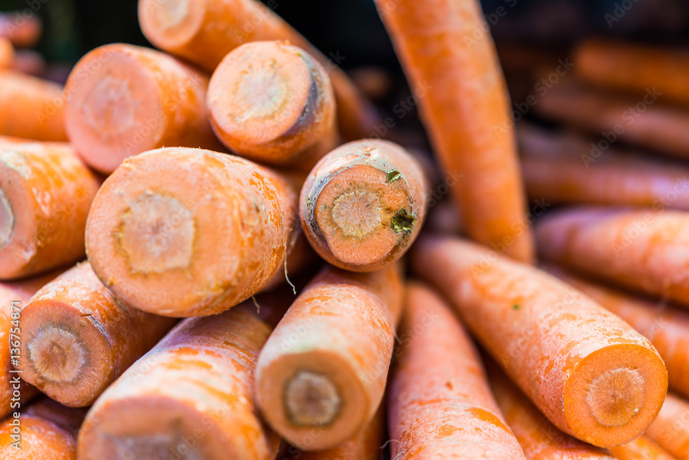 Macro closeup of large thick carrots on display Stock Photo | Adobe Stock