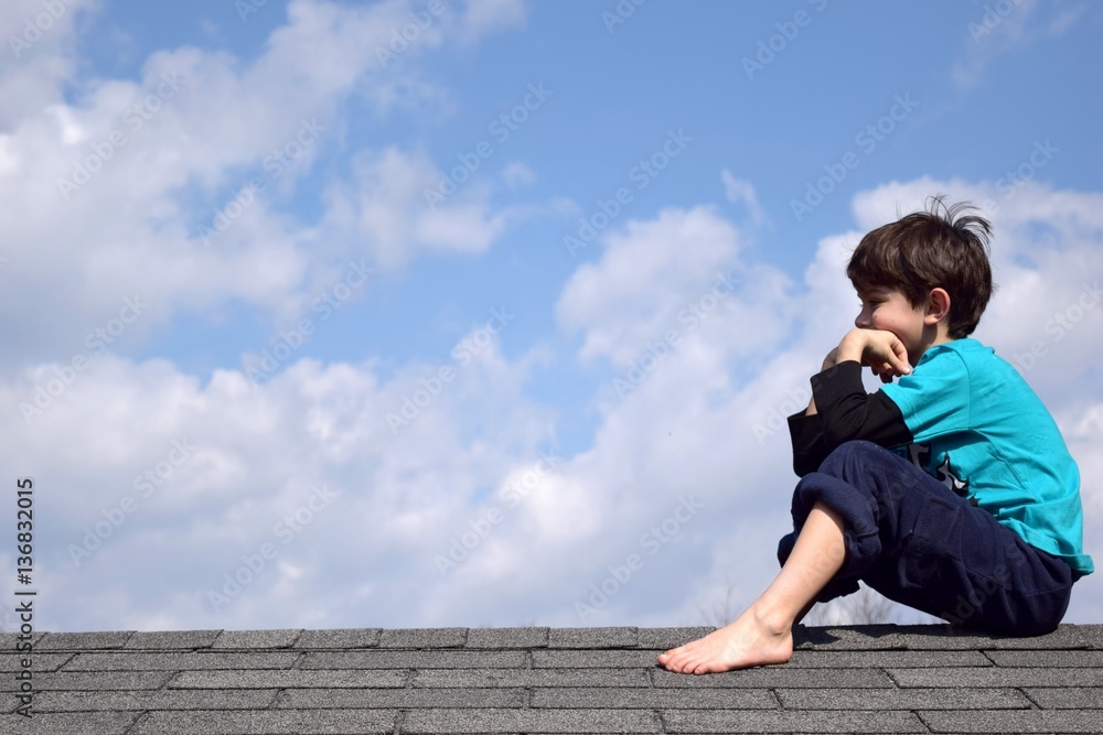 Boy On Roof