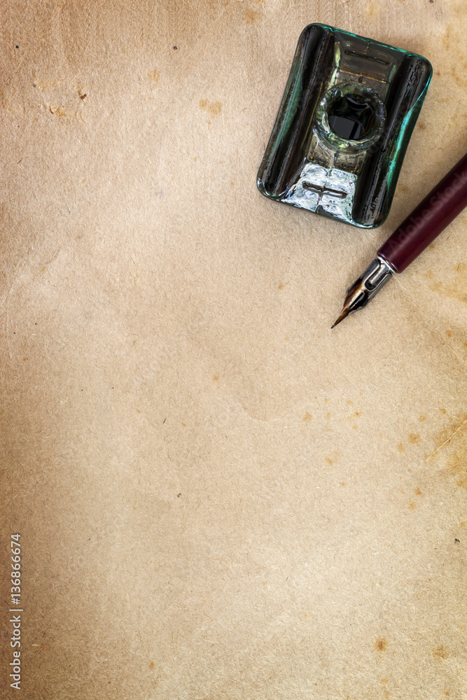 Nib Pen and Inkwell over Vintage Paper Top View Stock Photo | Adobe Stock