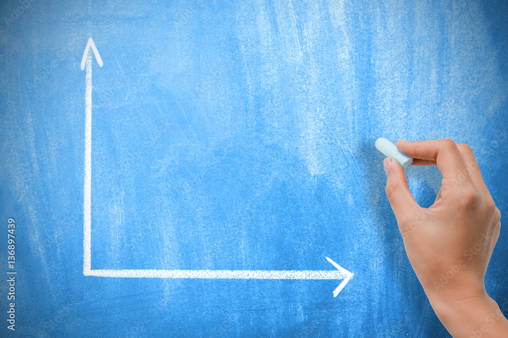 Empty or blank blue chalkboard with two axis graph and hand- Cartesian ...