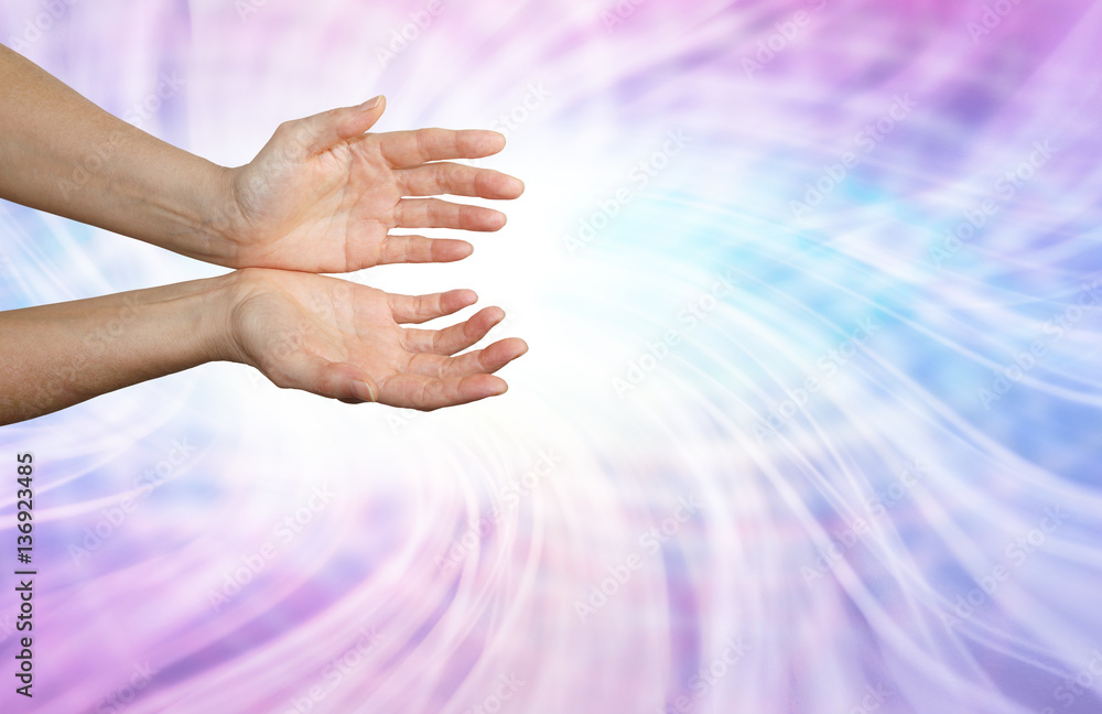 Matrix Energy Field - Female hands held palms up in a pink and blue ...