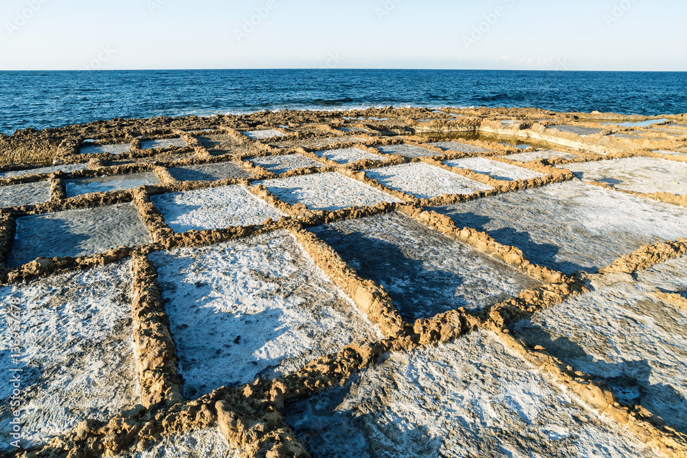 Salt pans in Gozo, Malta Salt evaporation ponds located near Qbajjar on ...
