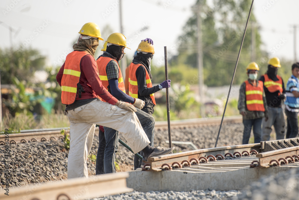 Construction team work in standard construction safety uniform ...