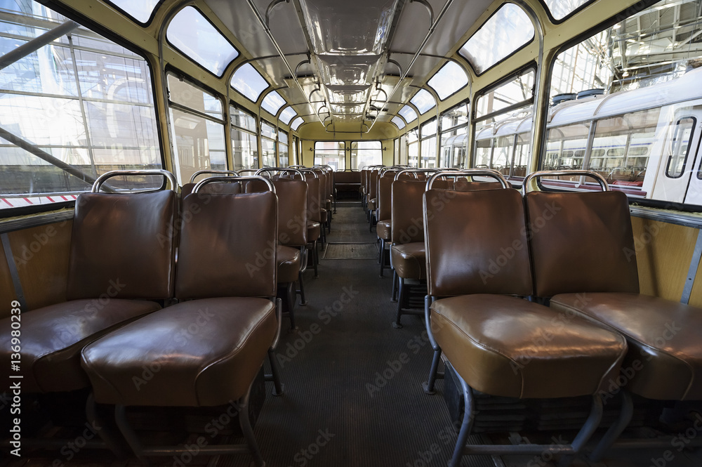 Retro bus inside, old public transport interior with leather seats in ...