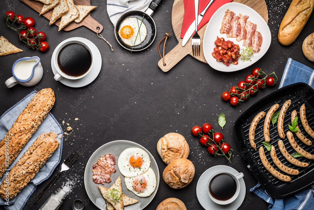 Full english breakfast on black chalkboard background Stock Photo ...