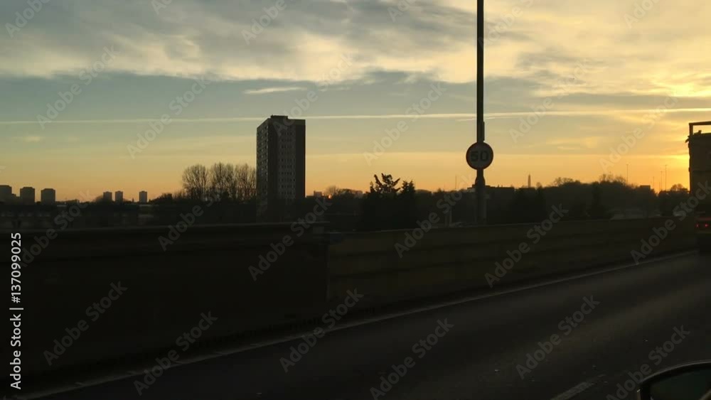 A beautiful sun set is marred by a dirty grubby lorry on an English ...