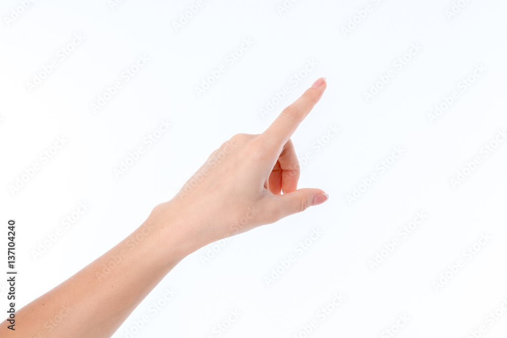 female hand outstretched to the side and pointing finger isolated on ...