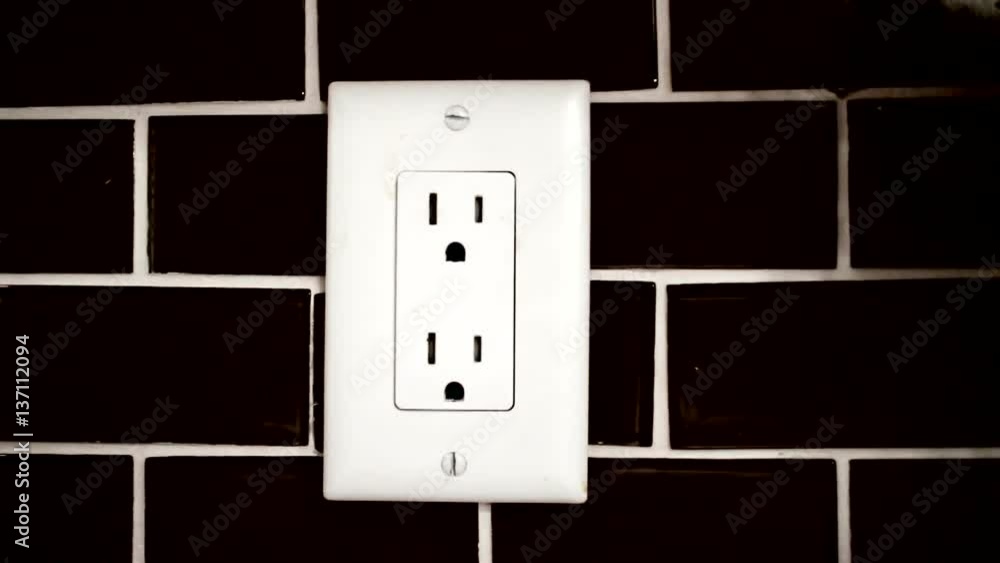 Stockvideon Sequence of an outlet on a wall in black and white. | Adobe ...