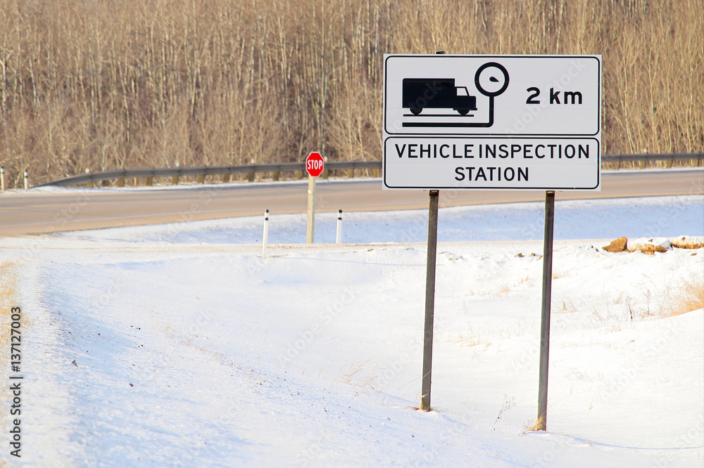 Vehicle Inspection Ahead Sign with Highway in the Background Stock ...
