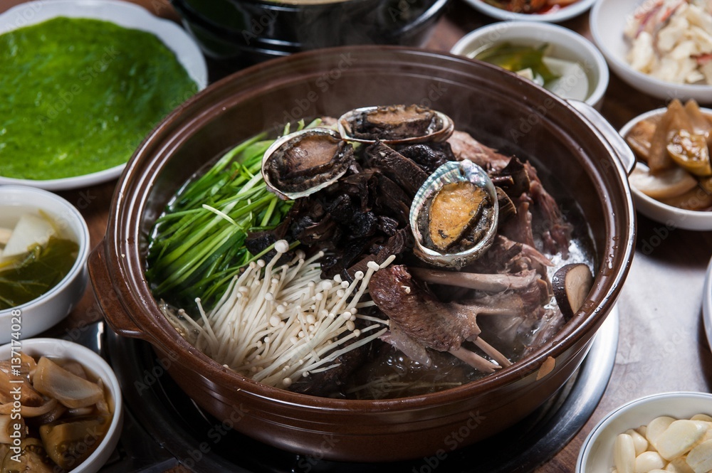 jeonbok Baeksuk. Whole Chicken Soup with Abalones Stock Photo | Adobe Stock
