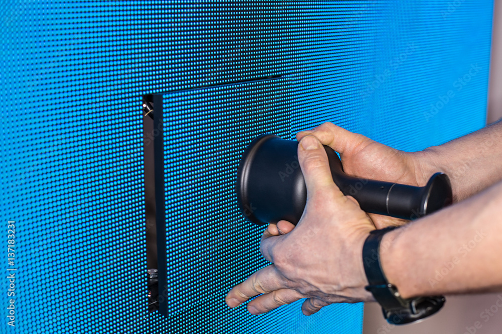 Manual assembling of the LED screen cluster Stock Photo | Adobe Stock