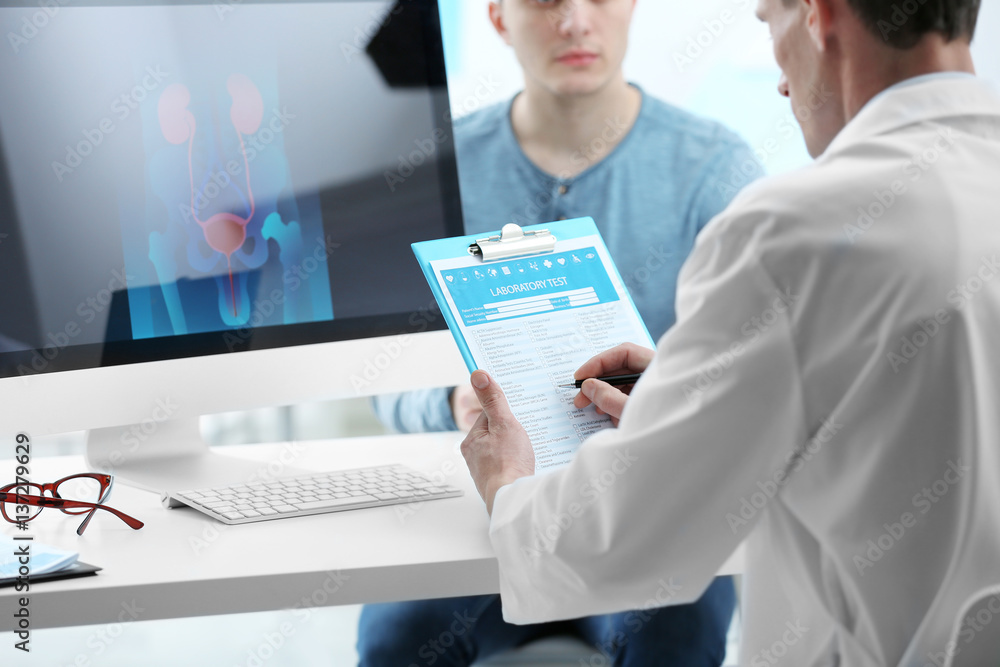 Urology concept. Doctor looking at laboratory test results and talking ...