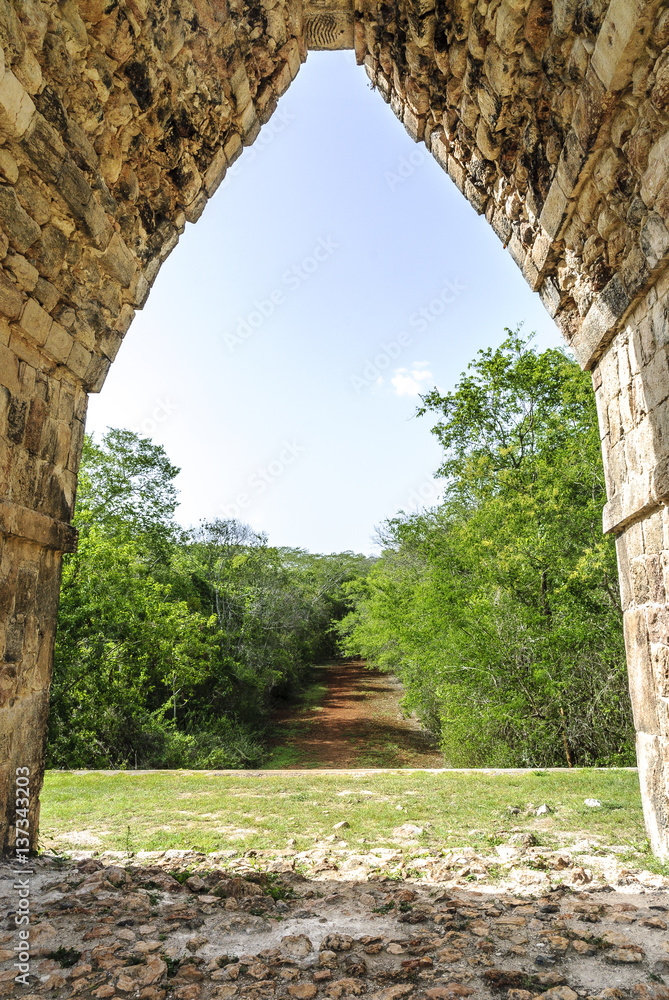 sight of the arch at the beginning of the sacbe in the archaeological ...
