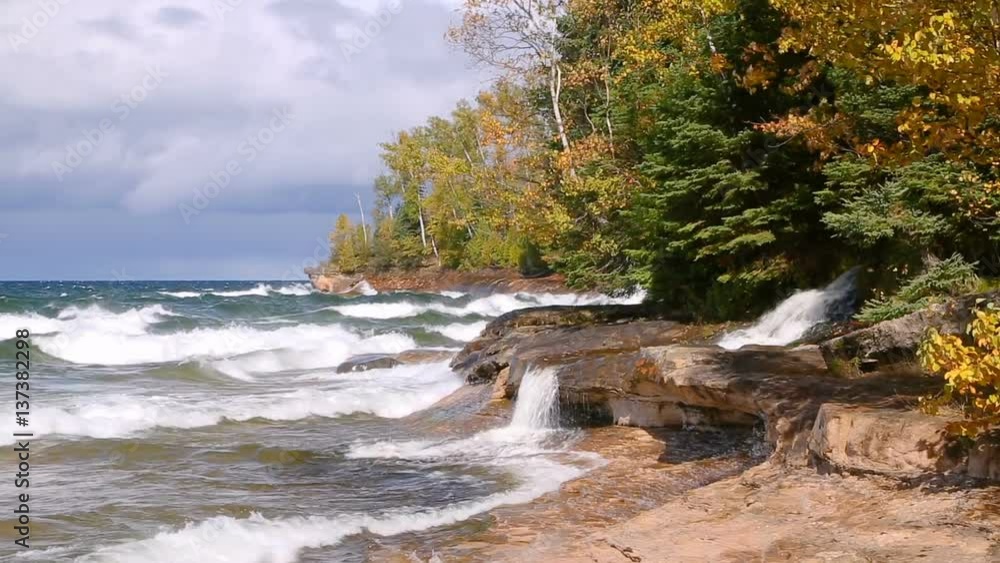 Loop features Elliot Falls waterfall pouring into a turbulent Lake ...