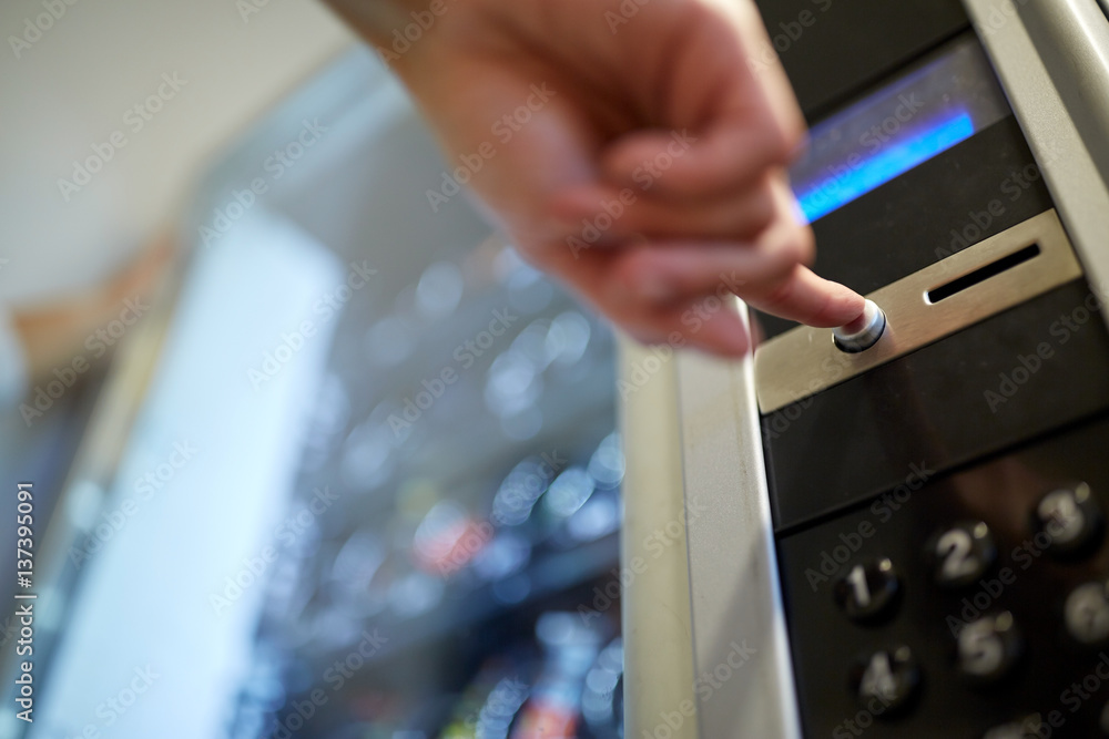 hand pushing button on vending machine Stock Photo | Adobe Stock