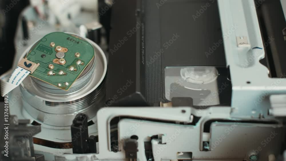 VHS Recorder Tape Sequence (4k). VHS recorder with tape showing inner ...