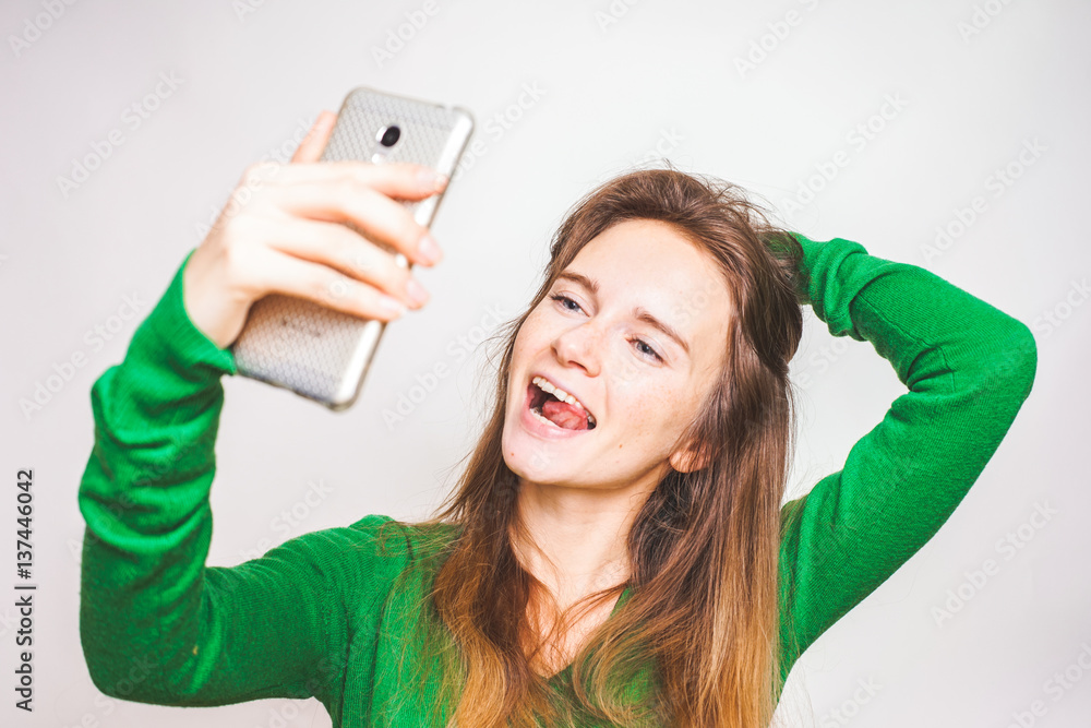 Funny face teen making selfie Stock Photo | Adobe Stock