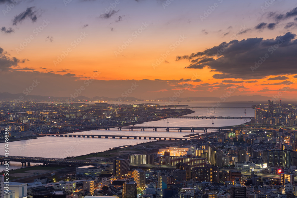 City of Osaka with river and sunset sky background, Japan Stock Photo ...